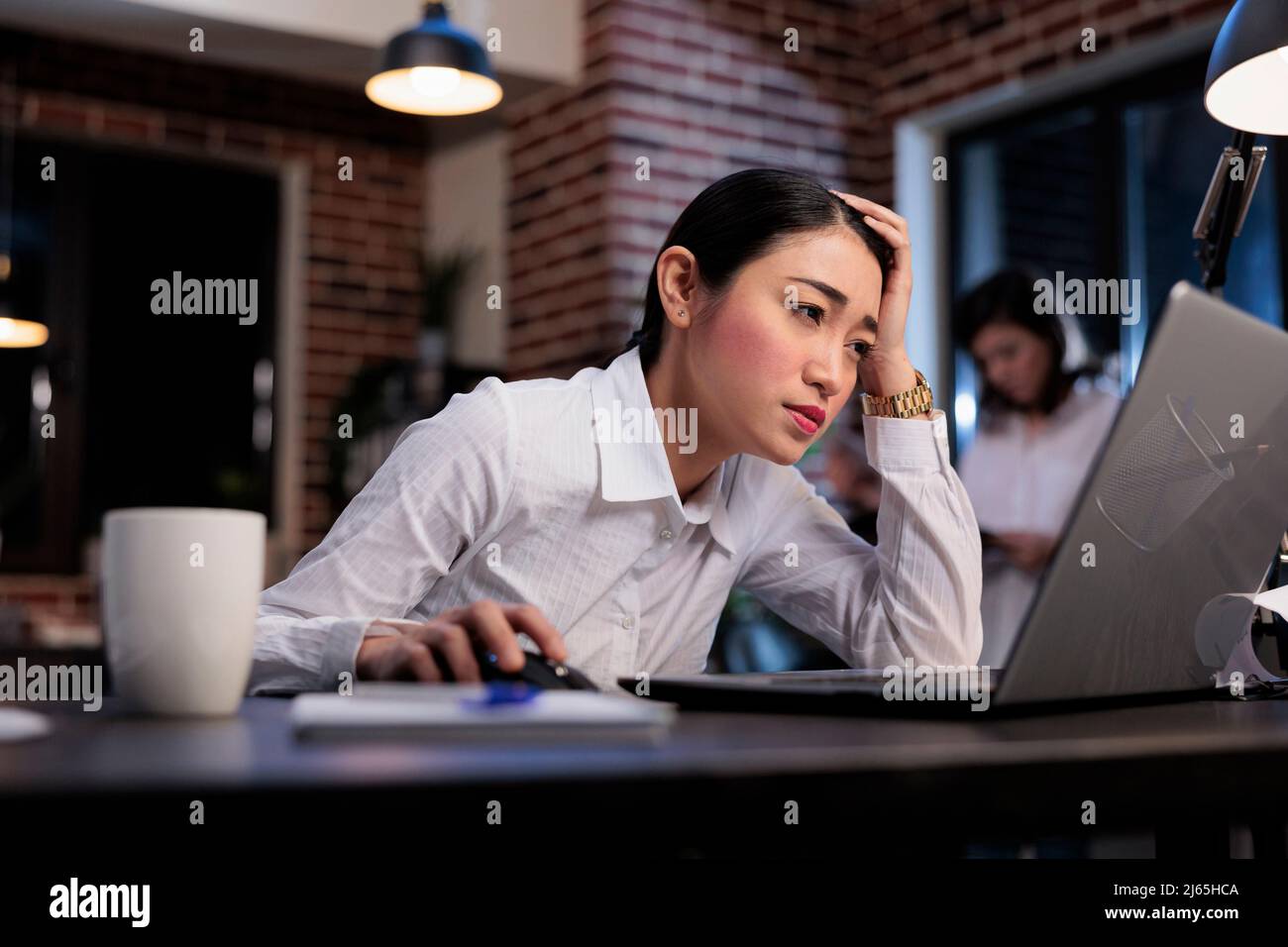 Stressed executive manager with burnout syndrome reviewing accounting ...