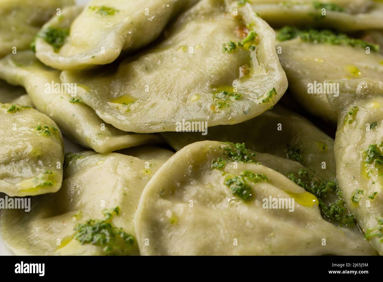 Traditional ukrainian dish vareniki served in a bowl with greaves and ...