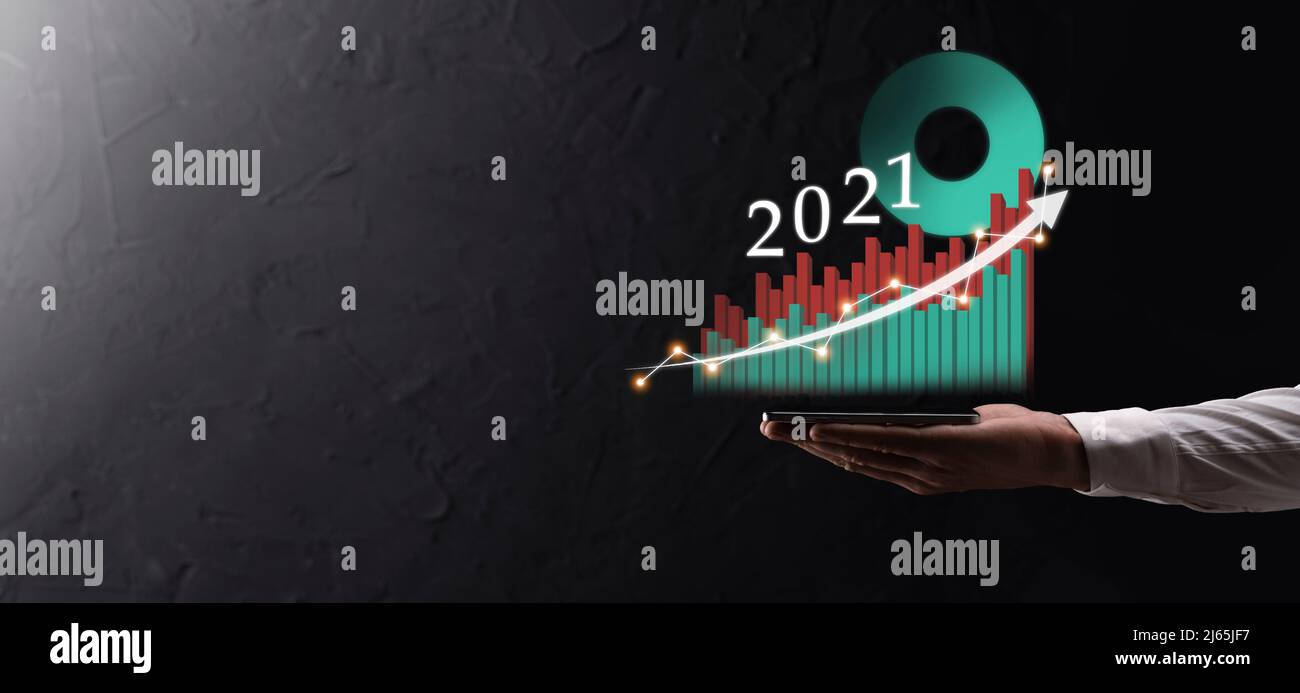 Businessman hold drawing on screen growing graph, arrow of positive ...