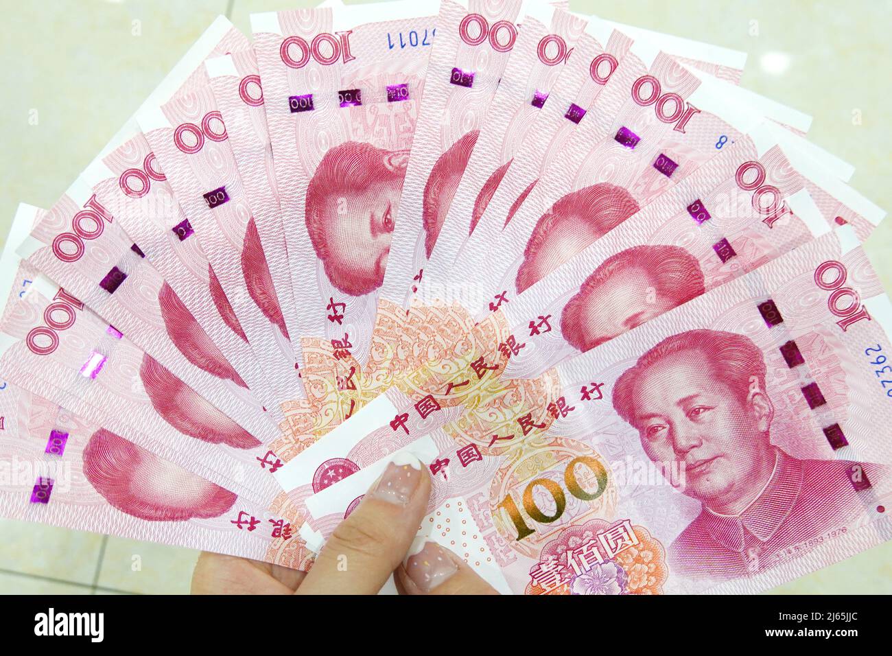 100 Chinese Yuan Renminbi banknote seen displayed. China's interbank ...