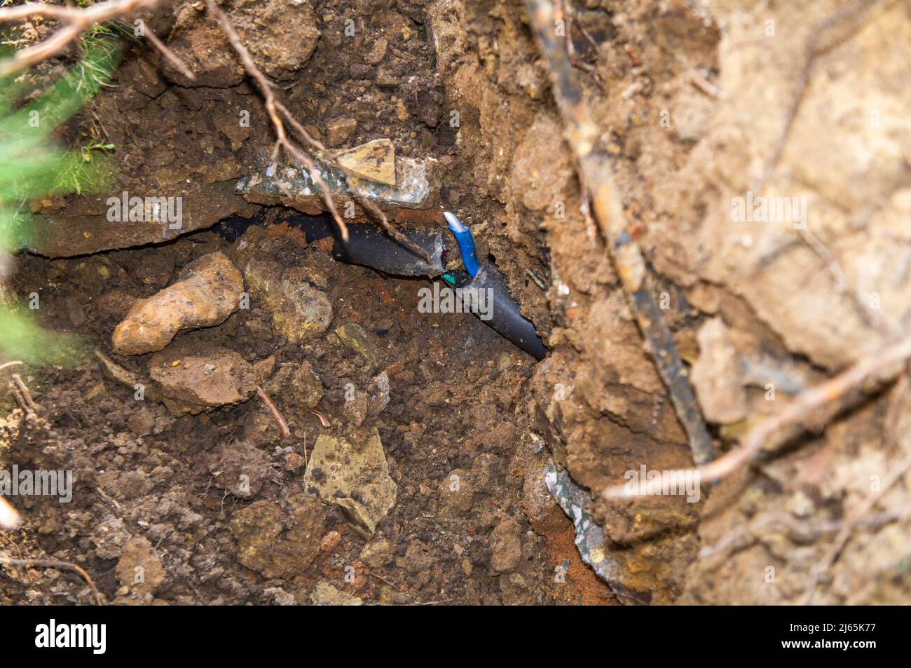 damaged underground cables when digging, snapped, broken power line cable, wiring, broken power ...