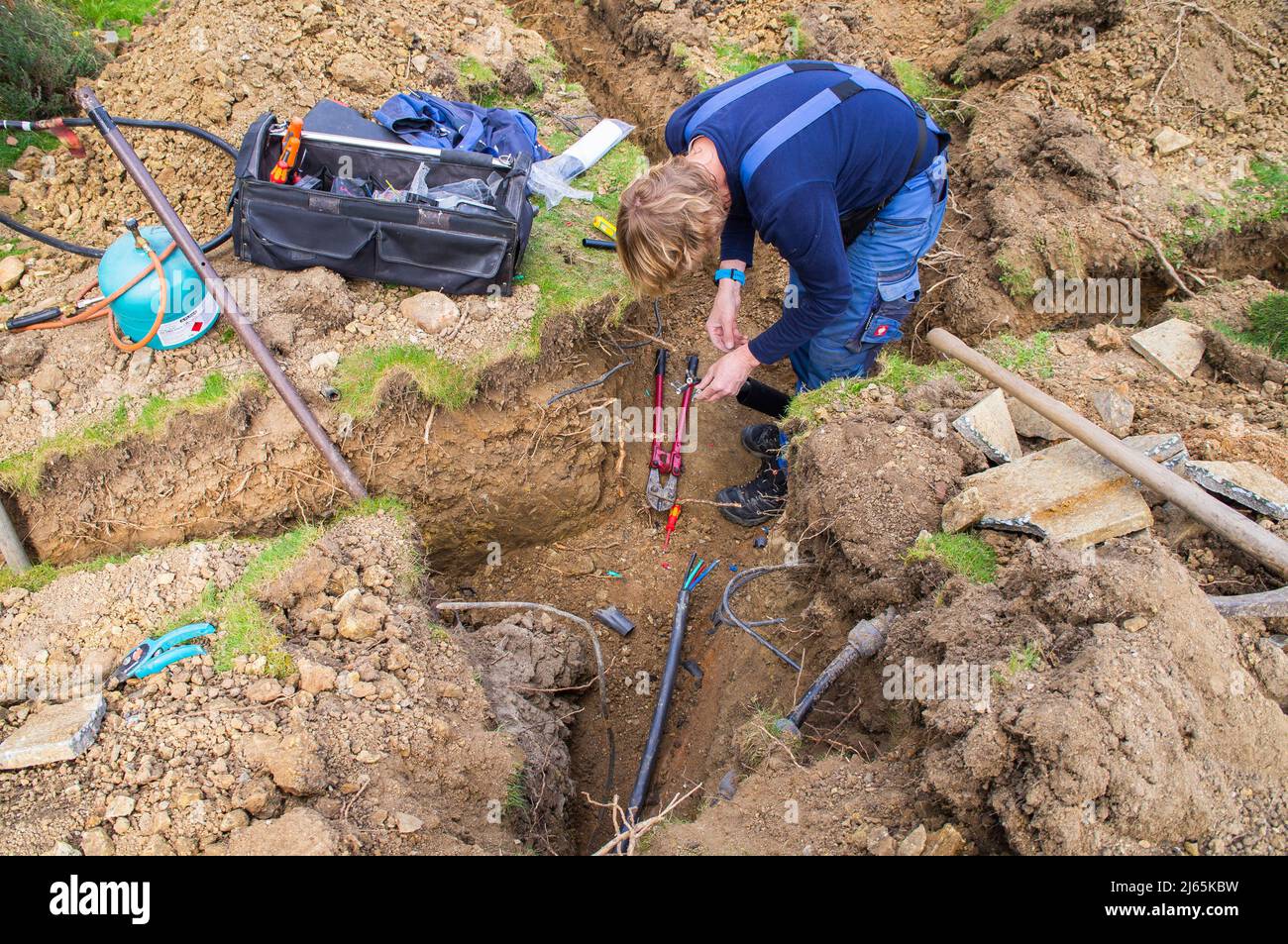 damaged underground cables when digging, snapped, broken power line cable, wiring, broken power ...