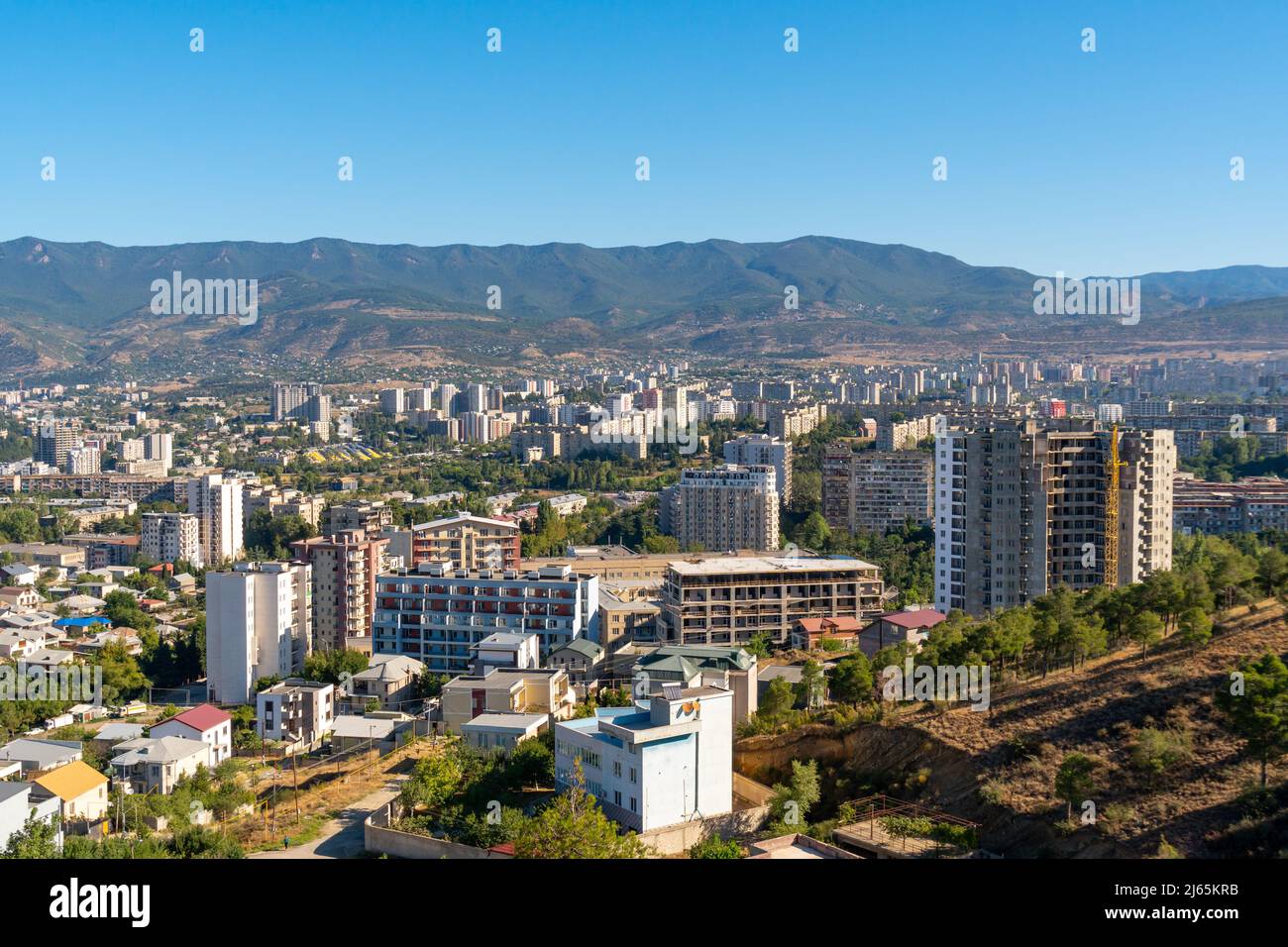 Residential area of Tbilisi, multi-storey buildings. Travel to Georgia ...