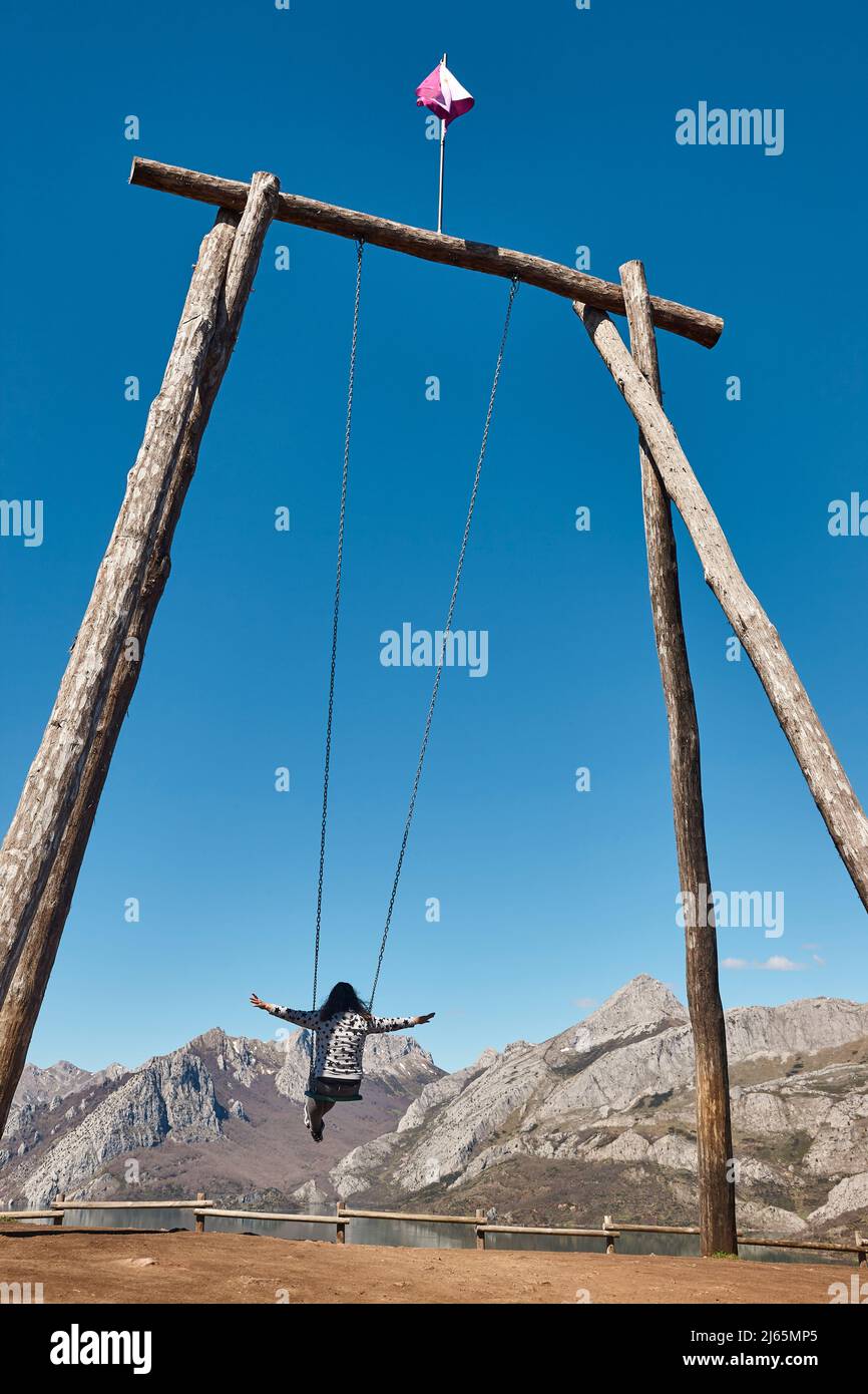 Famous huge swing surrounded by mountains in Riano village. Spain Stock ...