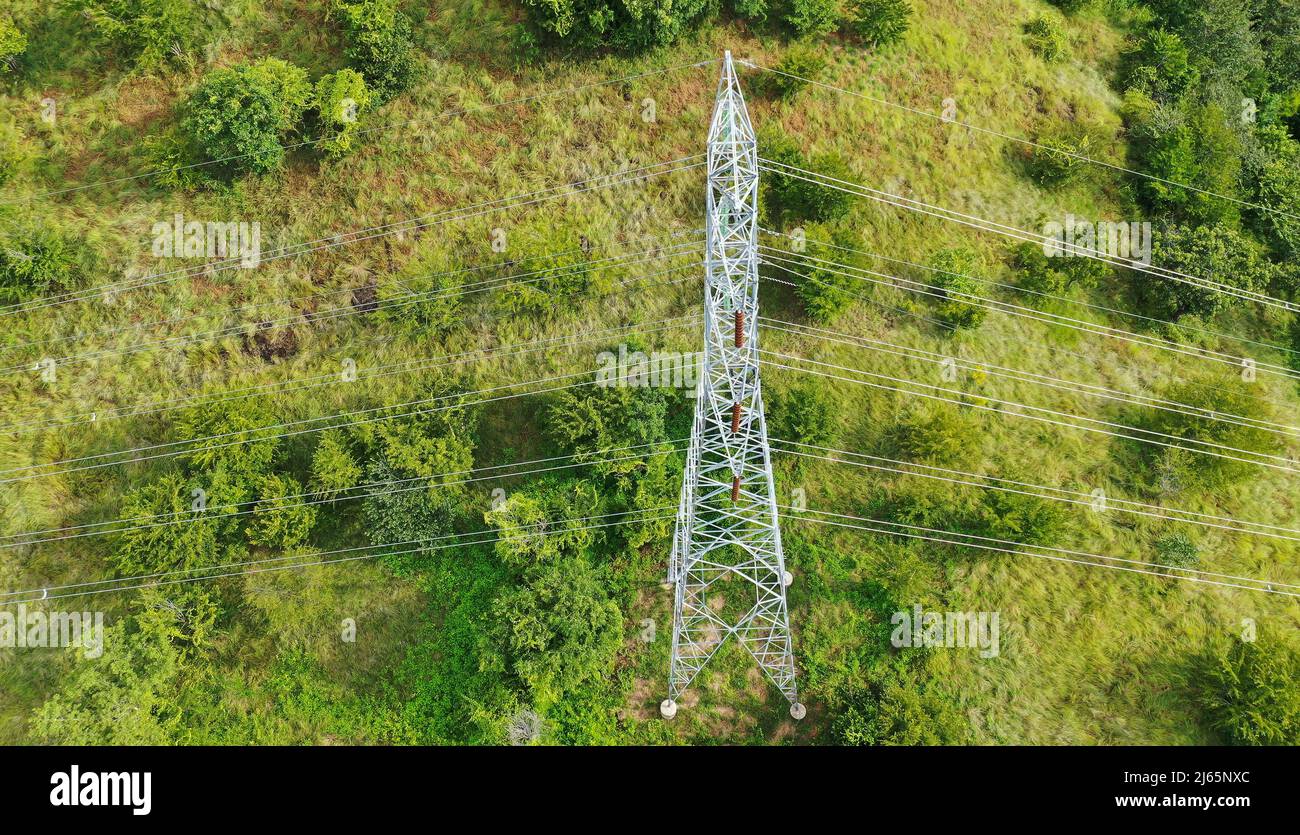 Power pylons and high voltage lines in a mountainous Areaagricultural ...