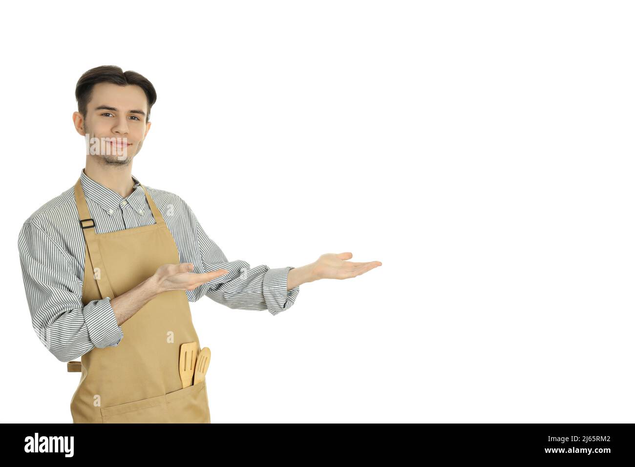 Concept of cooking with young attractive man isolated on white ...