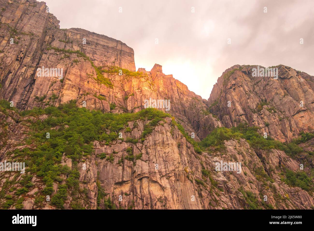 Cliff Preikestolen or Pulpit Rock sunset view in fjord Lysefjord ...