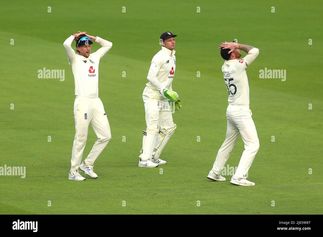 File photo dated 07-08-2020 of England's Joe Root (left), Jos Buttler ...