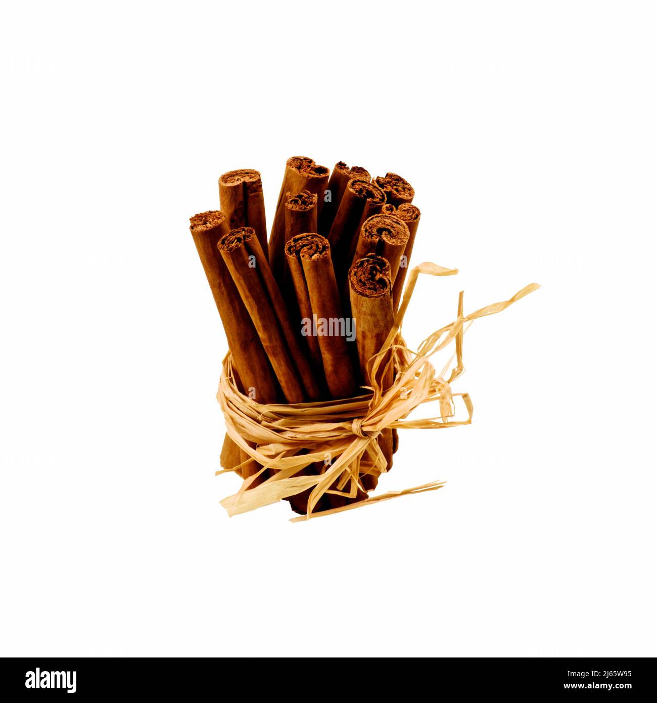 Bunch of Perfect Cinnamon Sticks with Dry Stems Bow isolated in White ...