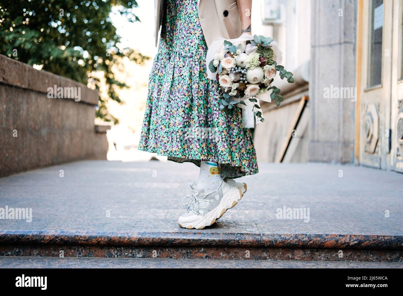 Contemporary modern trendy Hipster bride in informal dress and sneakers ...