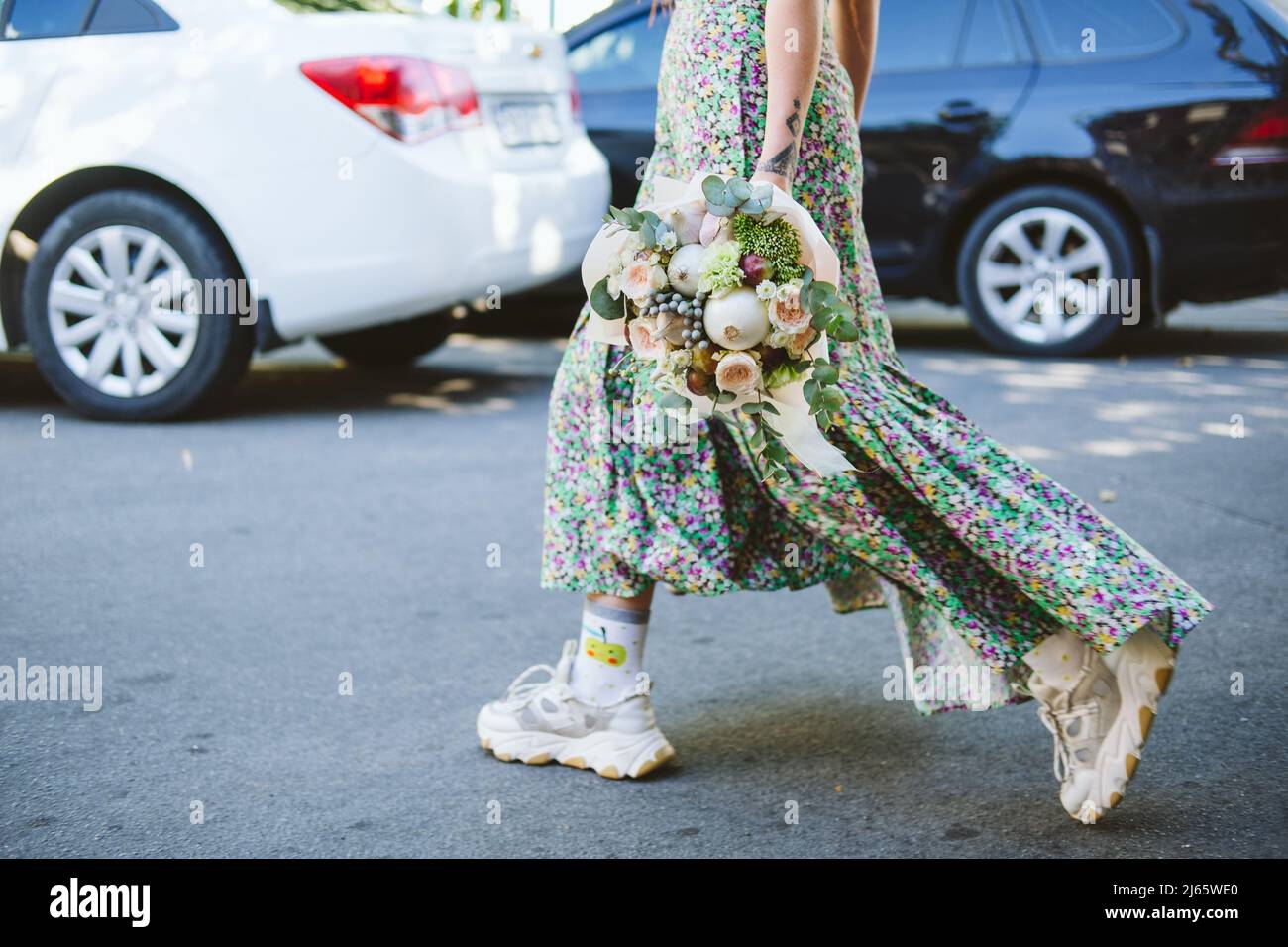 Contemporary modern trendy Hipster bride in informal dress and sneakers ...