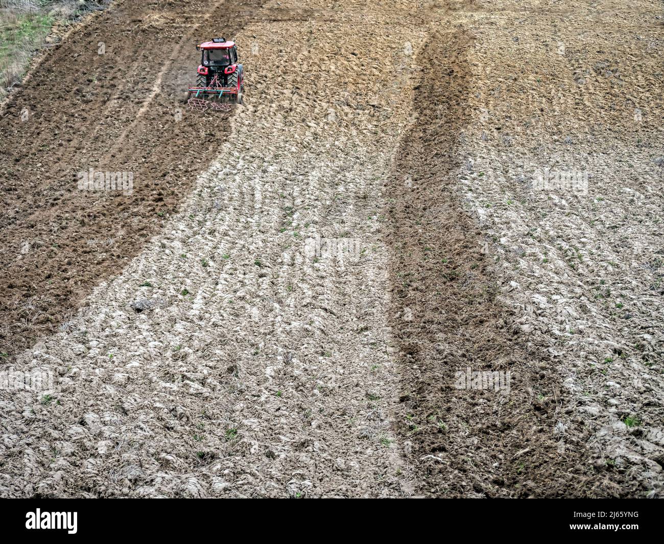 Aerial view tractor harrowing hi-res stock photography and images - Alamy