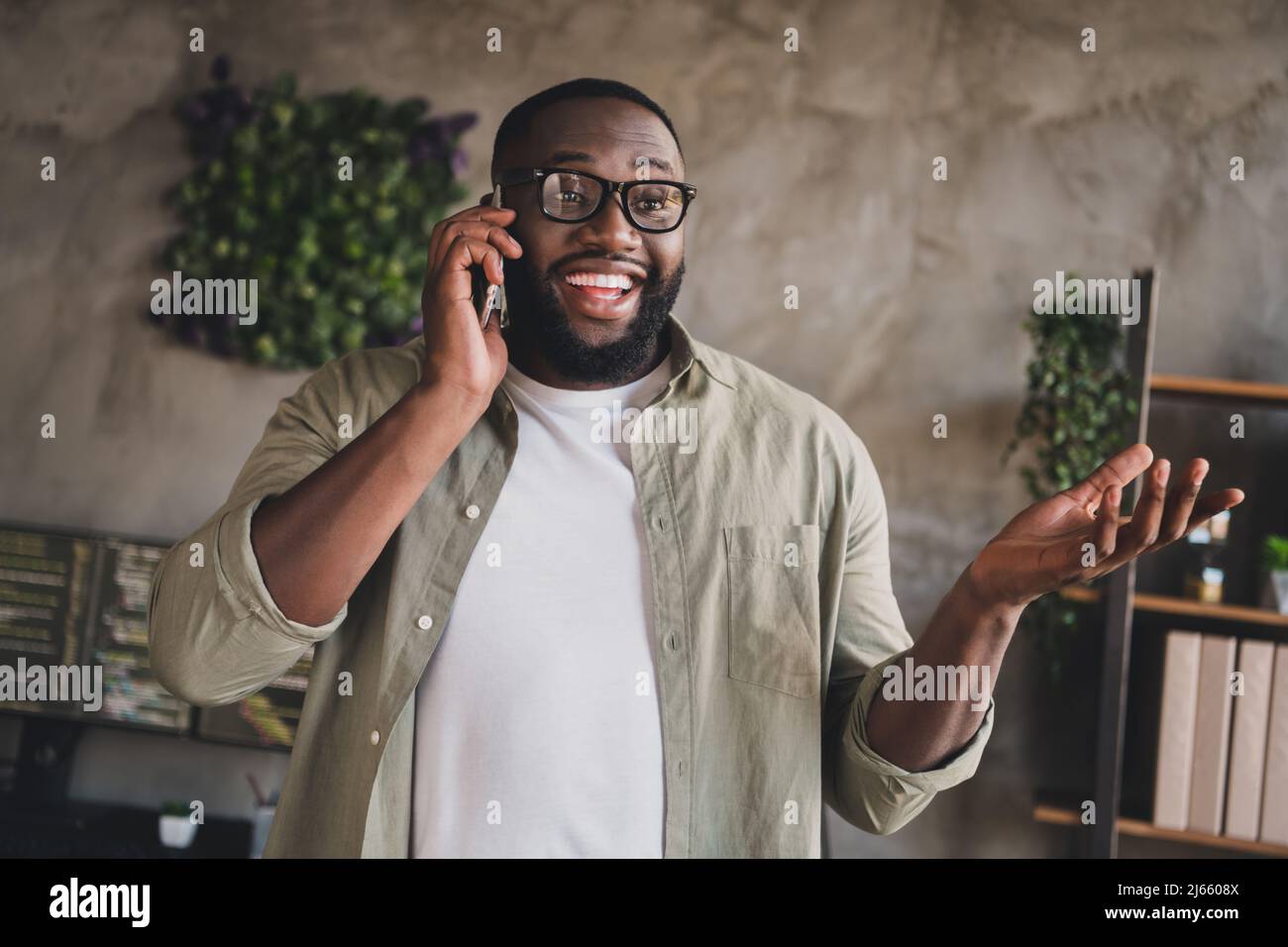 Portrait of attractive cheerful skilled intellectual funky guy tech ...