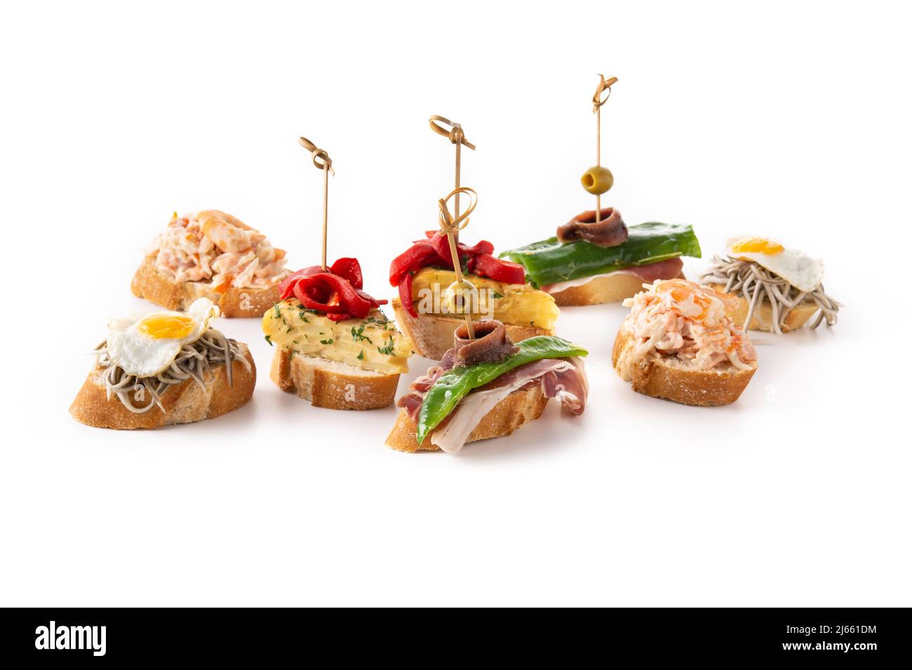 Assortment of Spanish pintxos isolated on white background Stock Photo ...