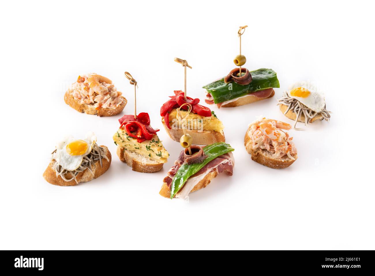 Assortment of Spanish pintxos isolated on white background Stock Photo ...
