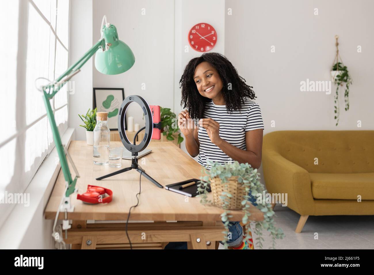 Young female influencer recording hi-res stock photography and images ...