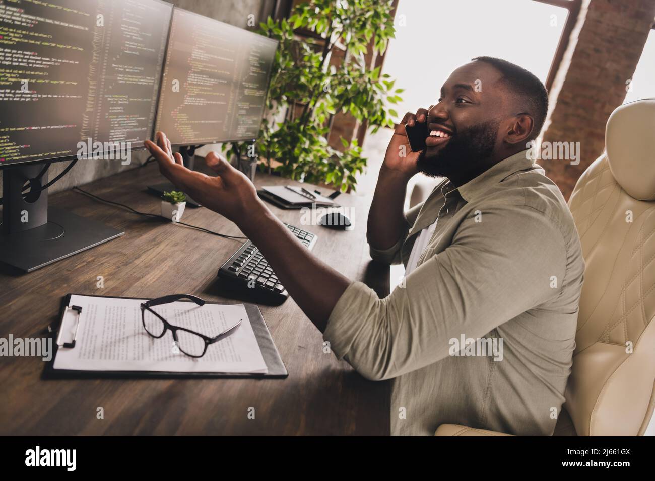 Profile side view portrait of attractive cheery skilled guy manager ...