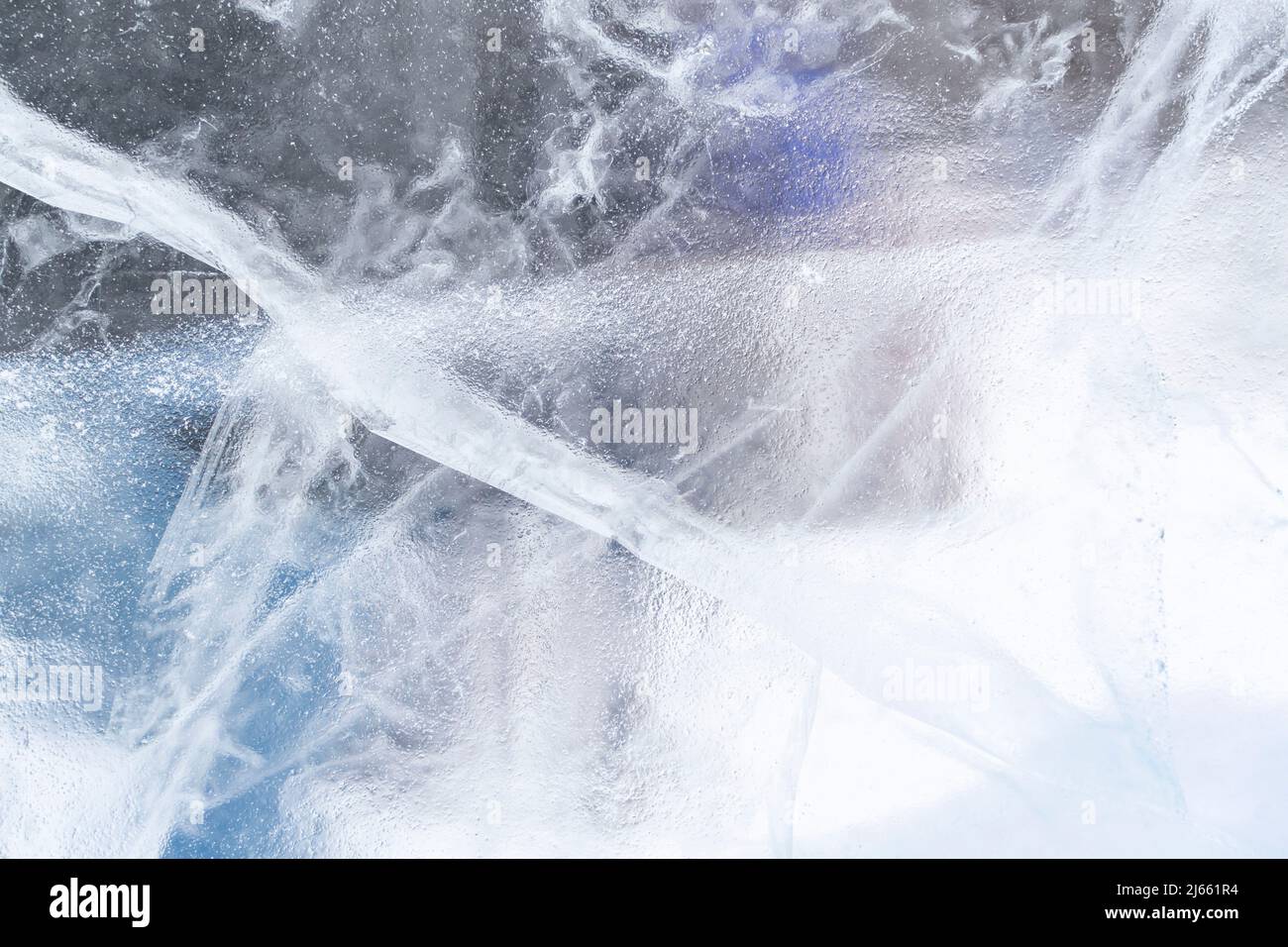 ice texture with cracks and patterns. winter background Stock Photo - Alamy