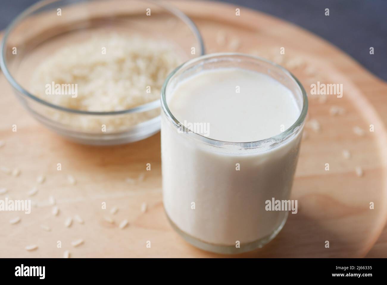 glass of milk and rice on a table, non dairy milk concept Stock Photo ...