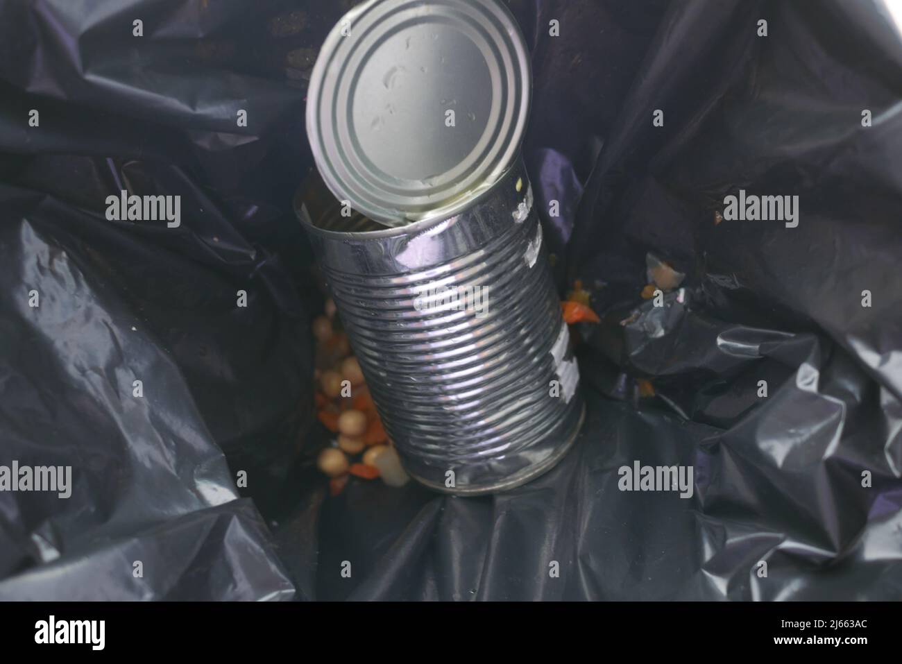 throwing garbage in a garbage bin Stock Photo - Alamy