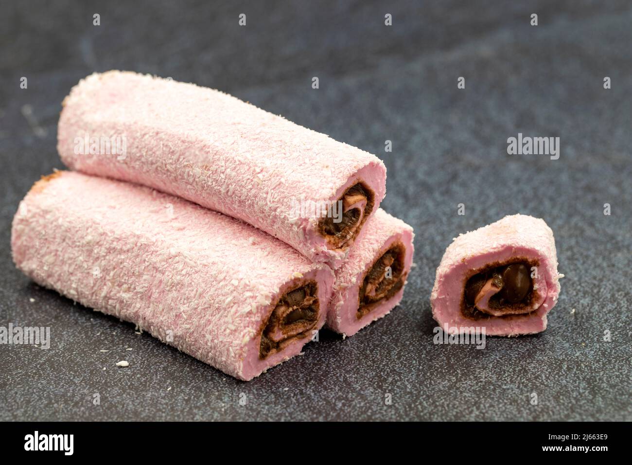 Turkish delight. Turkish delight with chocolate filling, on a dark ...