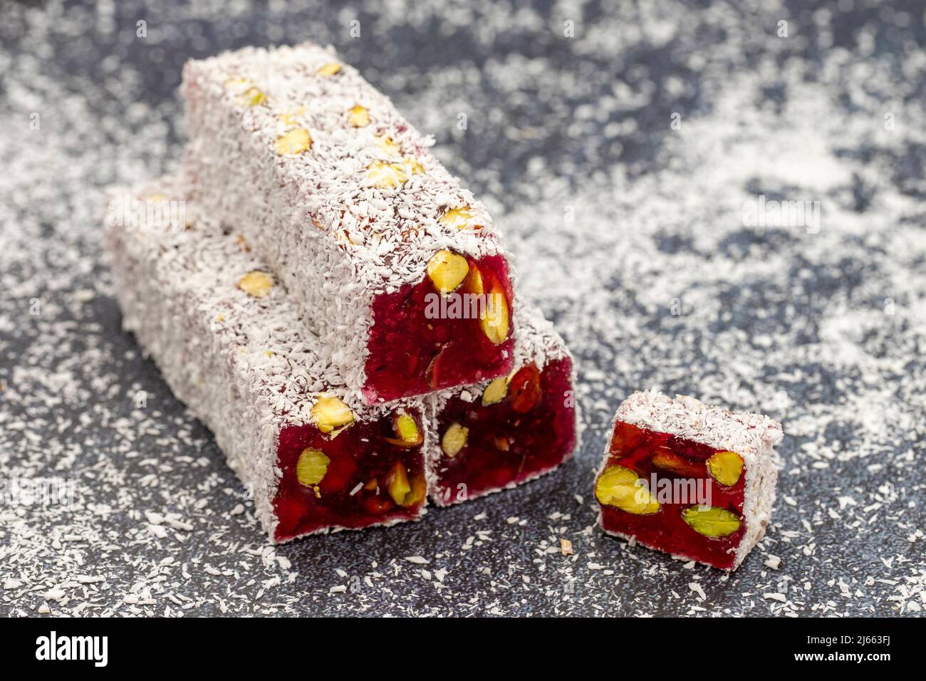 Turkish Delight with Pomegranate and Pistachio Rovings. Traditional Turkish cuisine delicacies ...