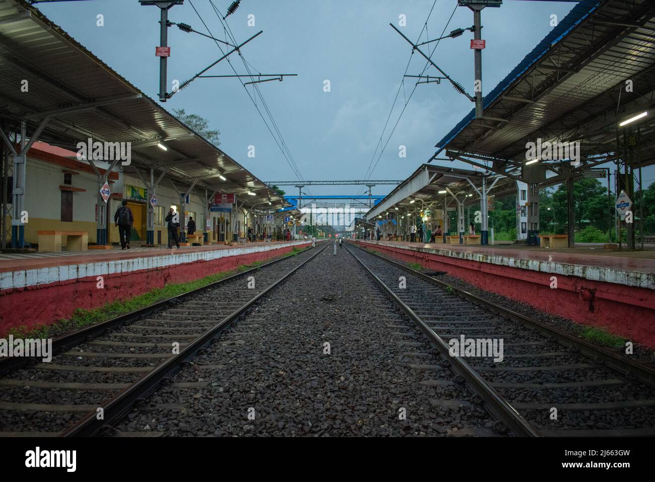 railway tracks between two platforms of the Railway station Stock Photo ...