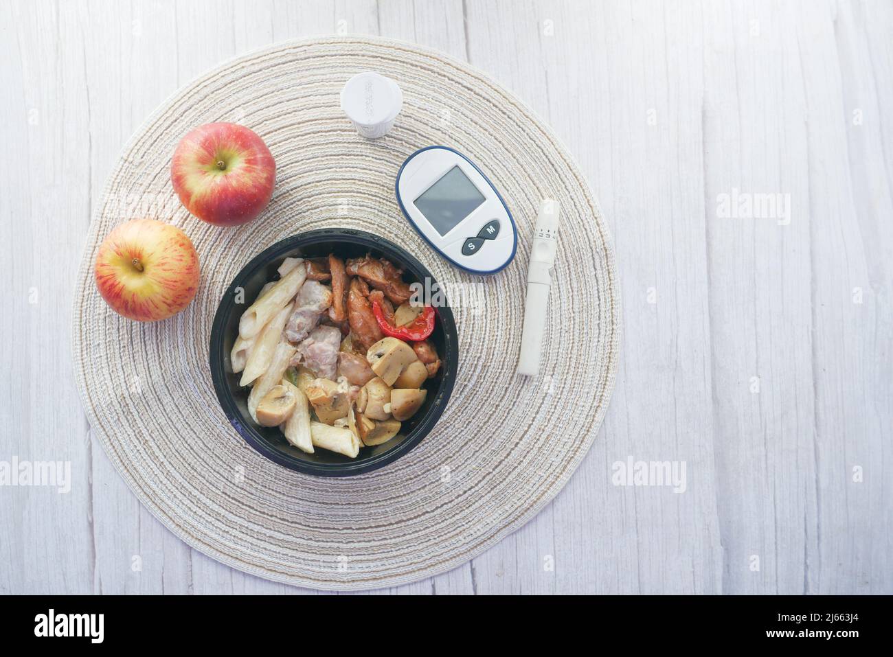 diabetic measurement tools and healthy food on table Stock Photo - Alamy