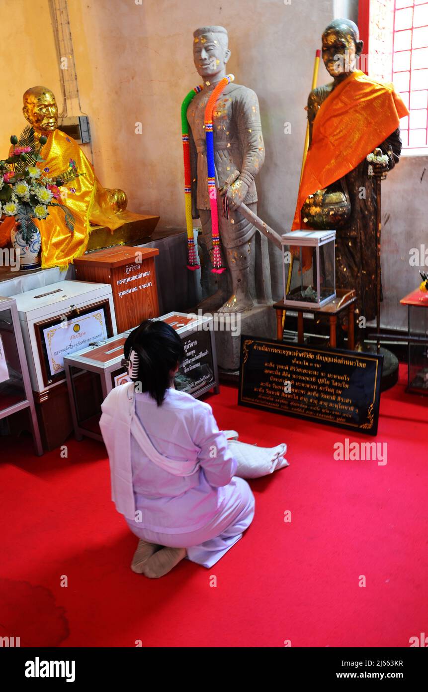 Thai nun women people travel visit and respect praying blessing holy ...