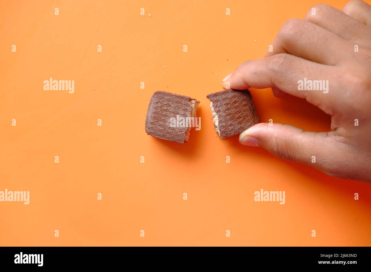 child boy hand pick dark chocolate Stock Photo - Alamy