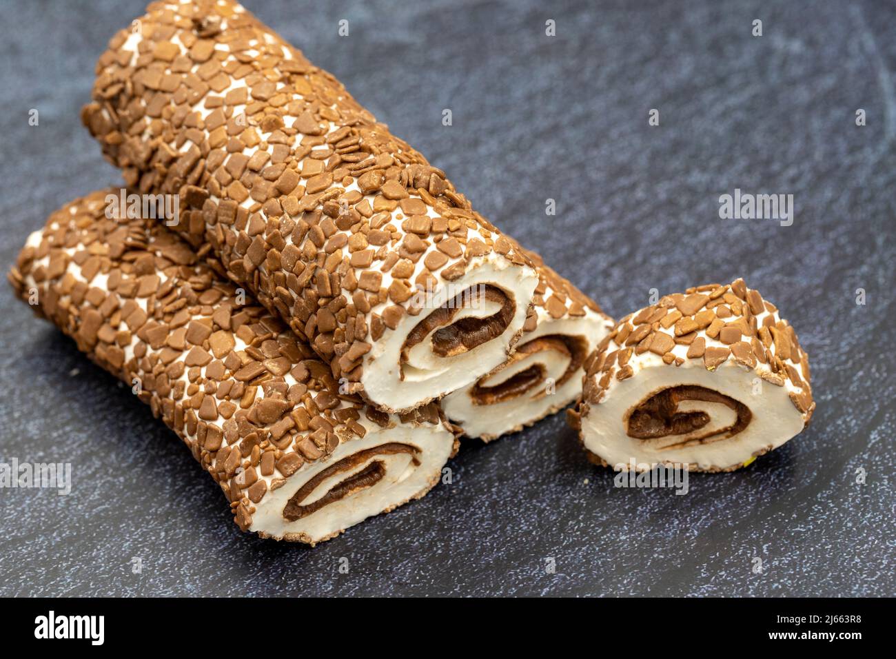 Turkish delight. Turkish delight with chocolate filling, on a dark ...