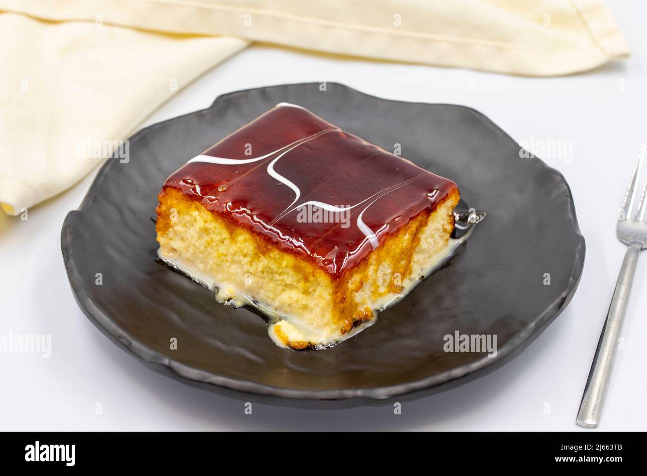 Trilece dessert with caramel on a white background. World cuisine ...