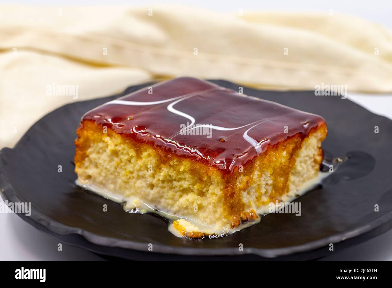 Trilece dessert with caramel on a white background. World cuisine ...