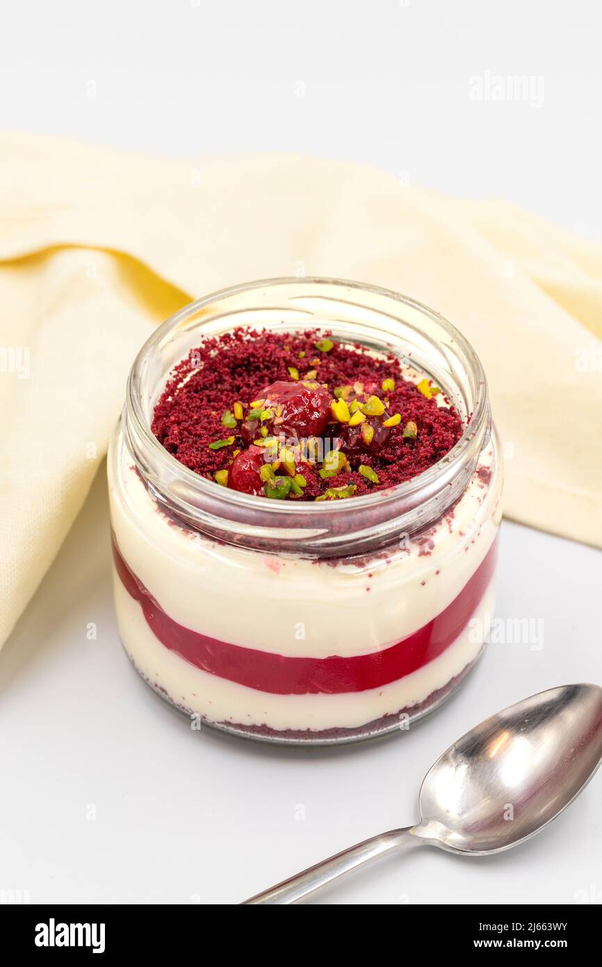 Magnolia dessert with raspberry on a white background. World cuisine ...