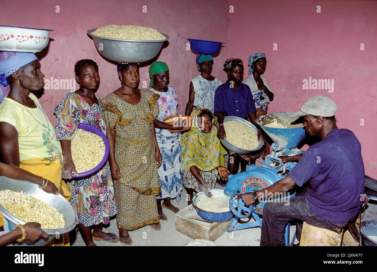 Ghana, Akarabon; women at a cooperative corn mill project Stock Photo ...