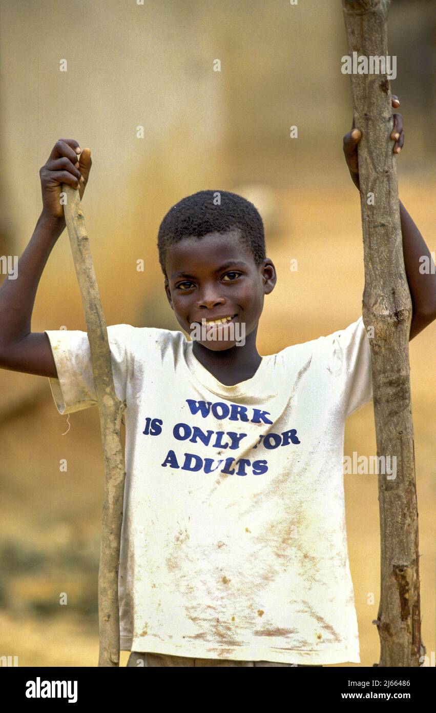 Ghana, Bawjiase; child with t-shirt against child labour Stock Photo ...