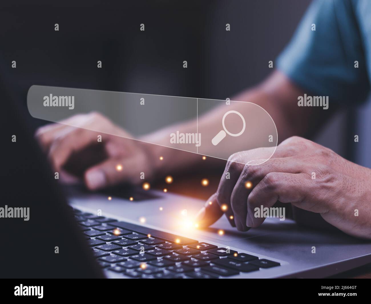 Data Search Technology Search Engine Optimization. man's hands are using a computer notebook to ...