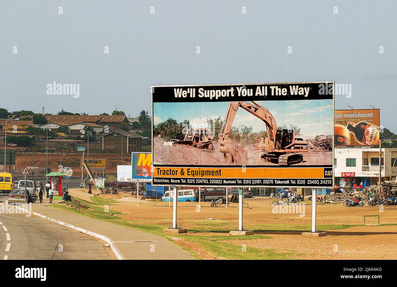 Ghana, an advertisement just outside Accra of a contractor with heavy ...