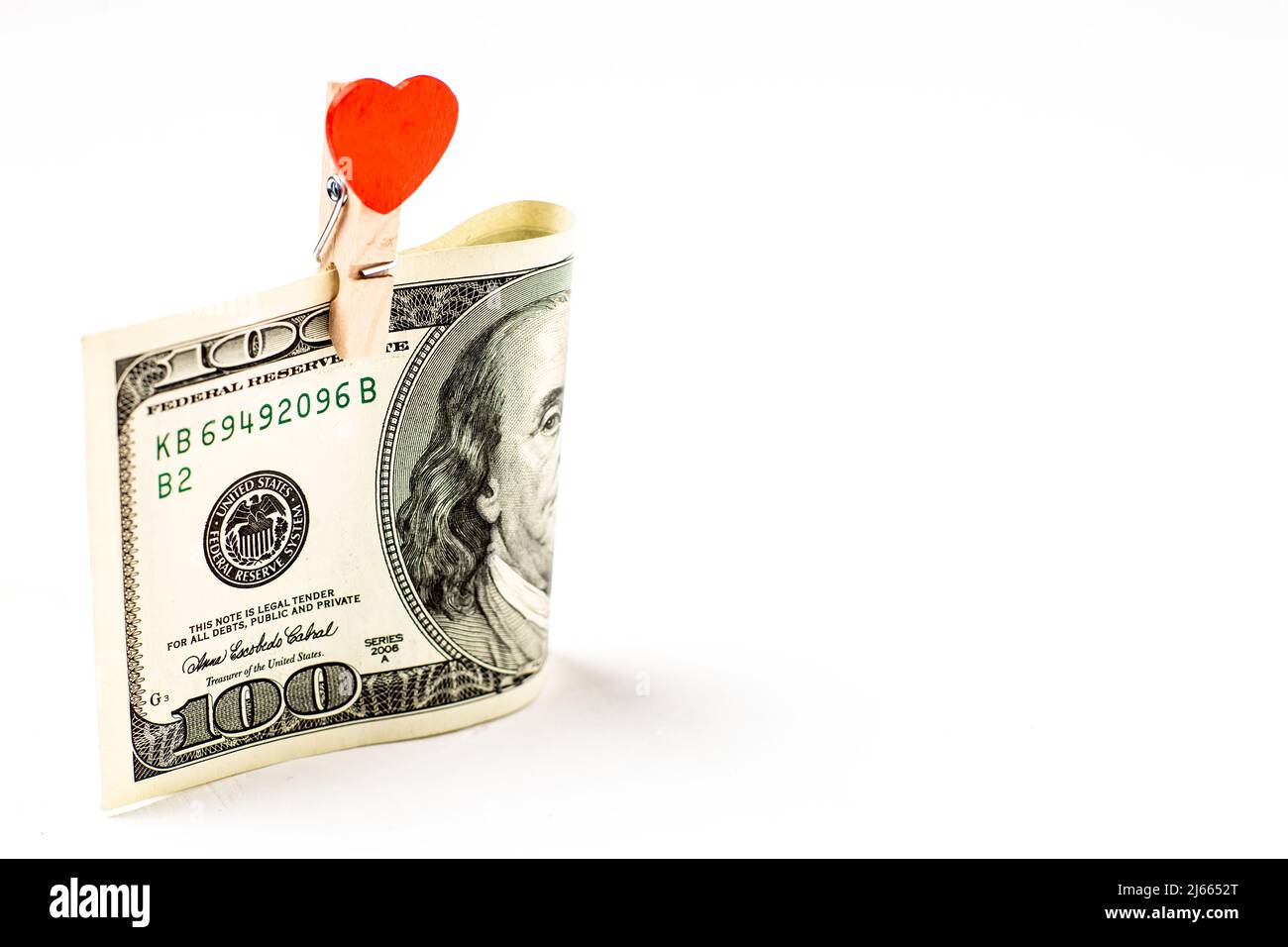 Dollar and a heart on a white background. Love for money, donations ...