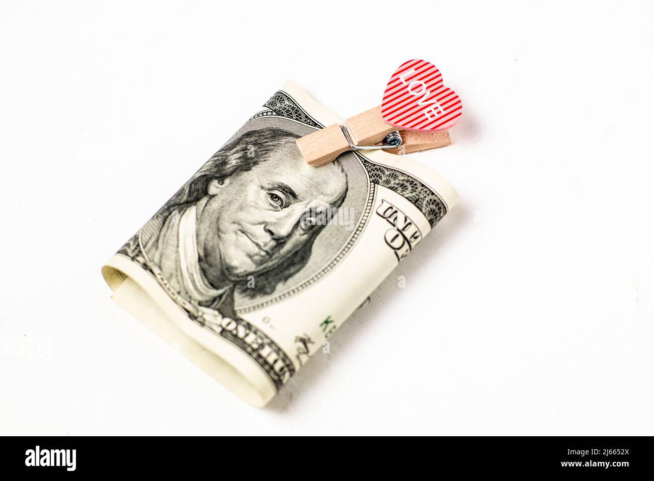 Dollar and a heart on a white background. Love for money, donations ...