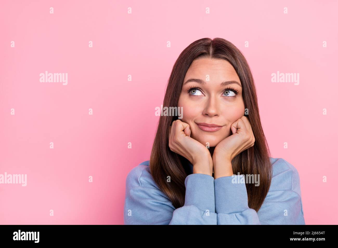 Portrait Of Attractive Cheerful Girly Girl Fantasizing Copy Blank Space Isolated Over Pink