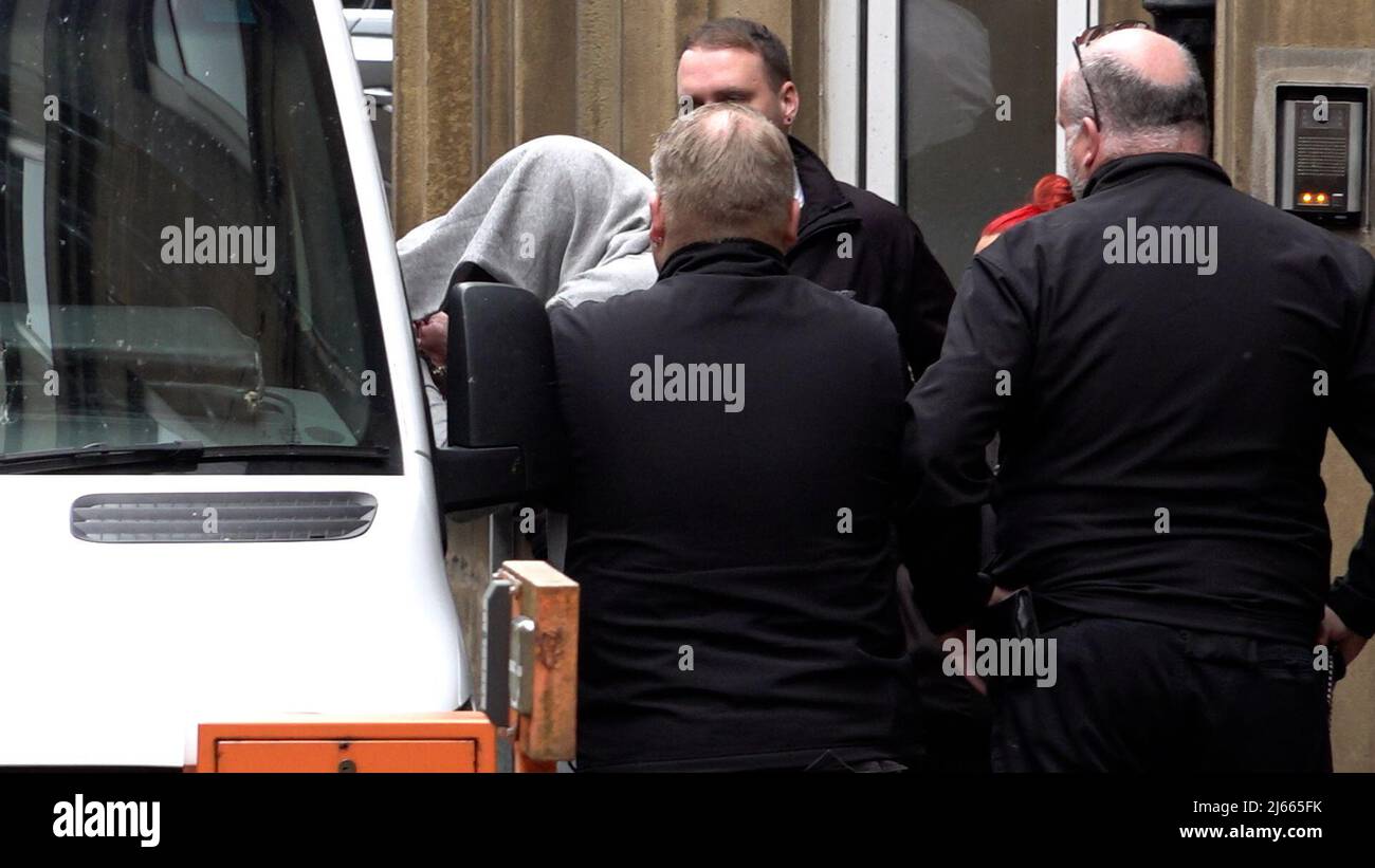 Andrew Burfield gets on a prison van as he leaves Blackburn Magistrates ...