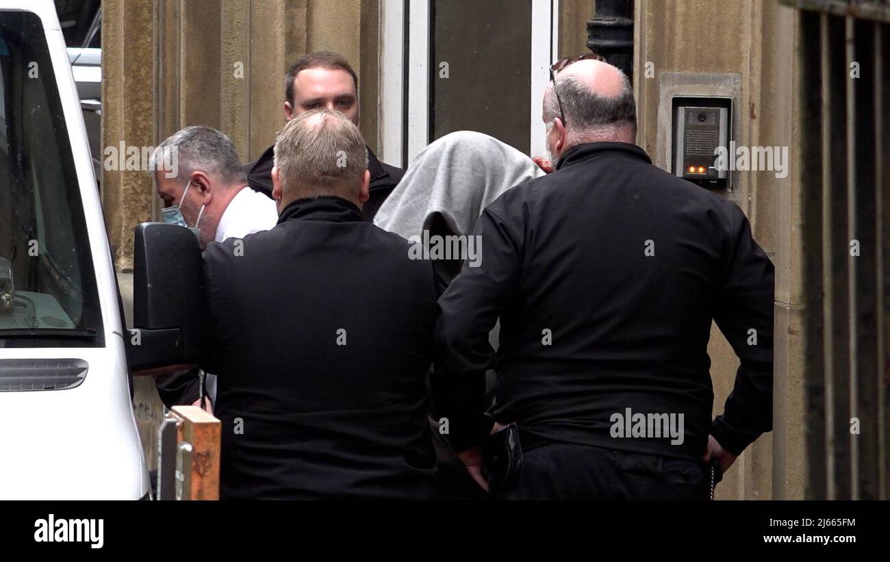 Andrew Burfield gets on a prison van as he leaves Blackburn Magistrates ...