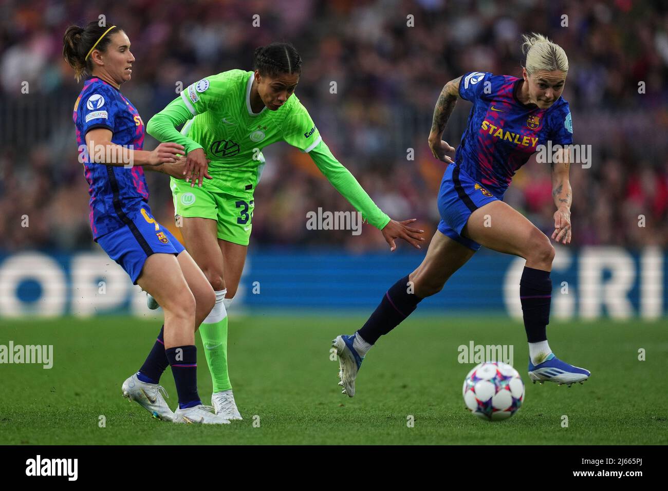 Turid Knaak of VFL Wolfsburg, Mariona Caldentey and Maria Mapy Leon of ...