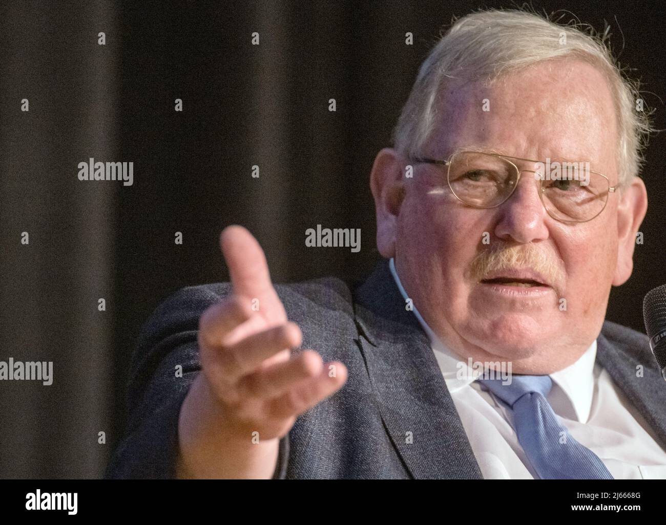 Laupheim, Germany. 28th Apr, 2022. Reinhard Genzel gestures at a panel ...