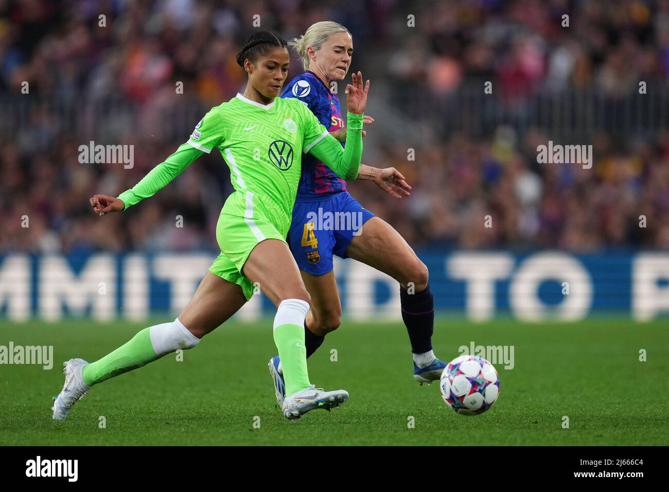 Turid Knaak of VFL Wolfsburg and Maria Mapy Leon of FC Barcelona during ...