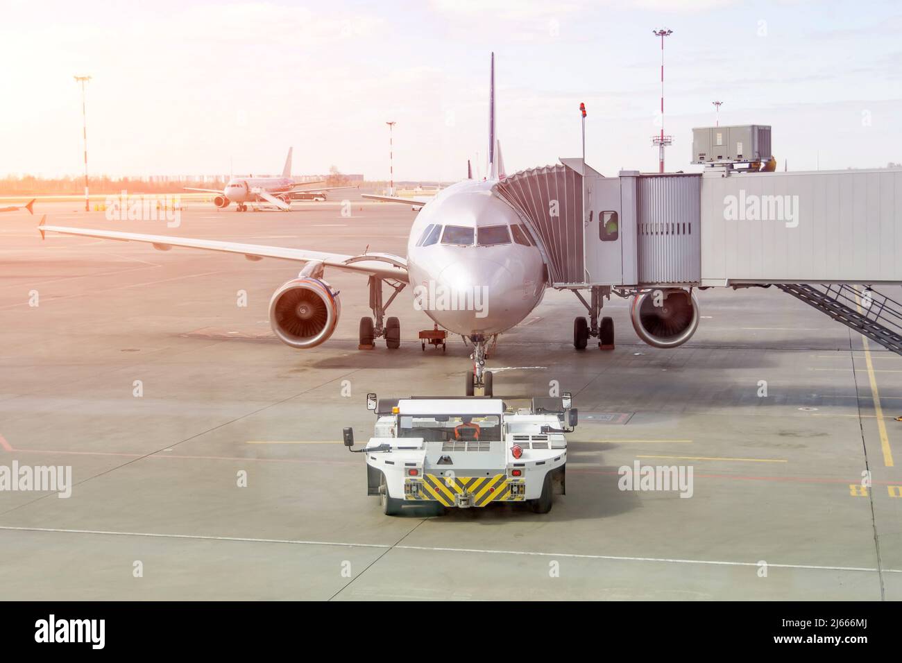 Departure of the airplane from the air bridge, towing and launch jet ...