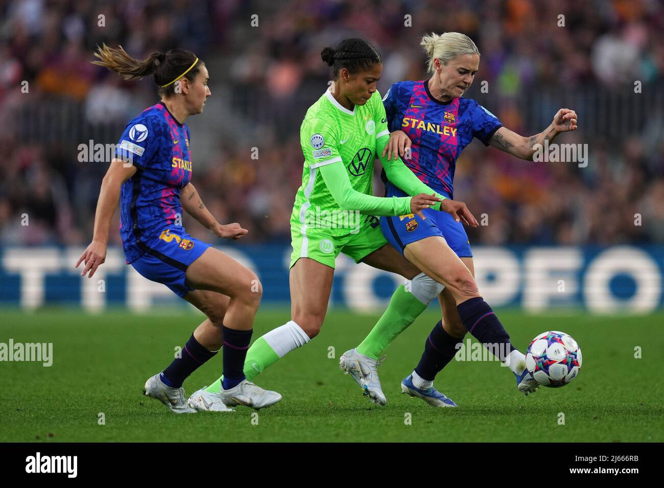 Turid Knaak of VFL Wolfsburg, Mariona Caldentey and Maria Mapy Leon of ...