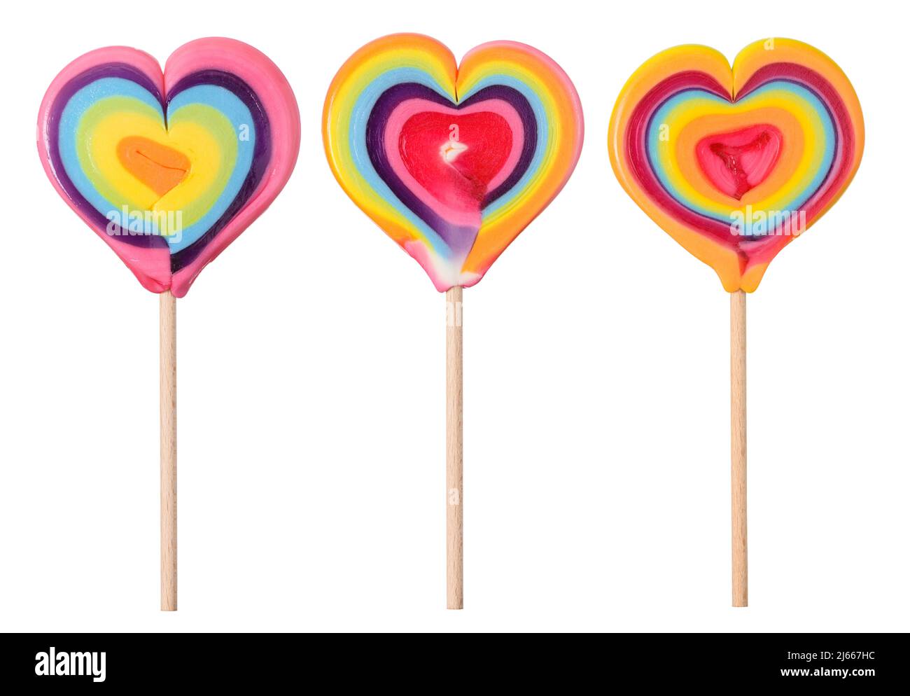 Heart shaped lollipop candy set on wooden stick isolated on white ...