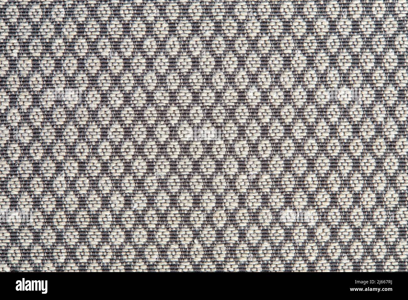 Knitted texture. Texture of jacquard fabric with gray geometric pattern ...